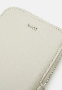 BOSS ADDISON HOLDER - Umhängetasche - open white/weiß - Zalando.de