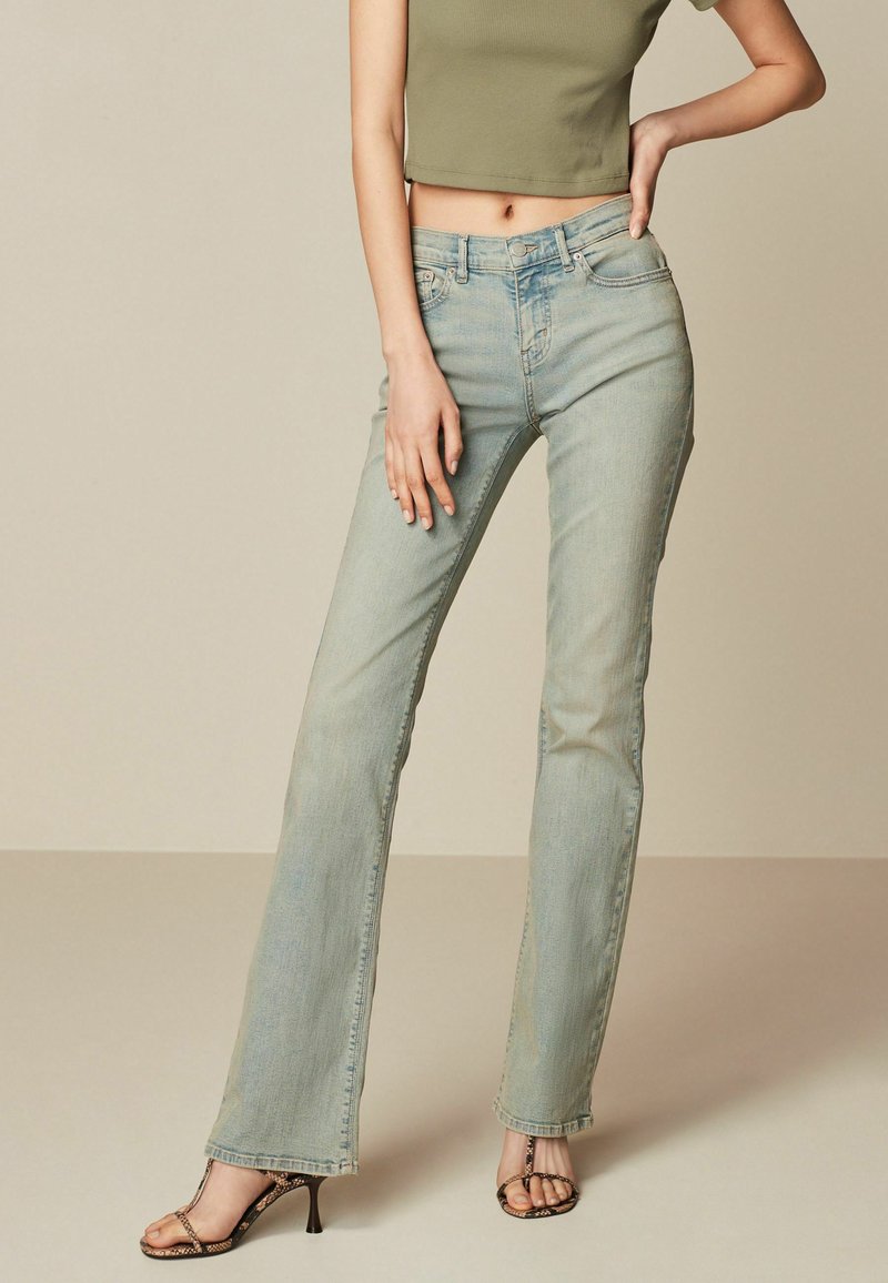 Next Jeans Bootcut - green tinted/grün - Zalando.ch