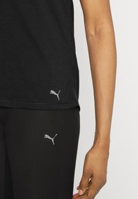 Puma STUDIO FOUNDATION - Sport T-Shirt - black/schwarz - Zalando.at