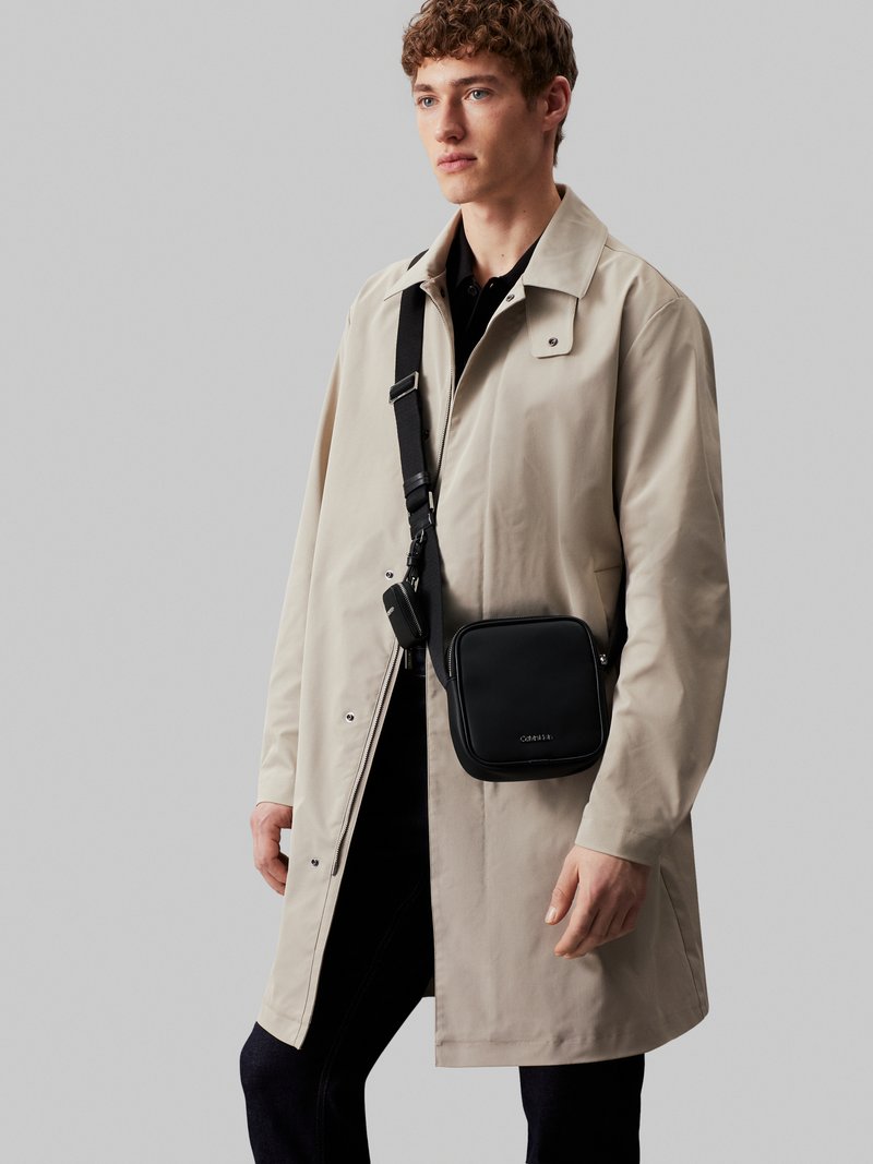 Calvin Klein CUBE REPORTER - Cross body bag - black - Zalando.co.uk