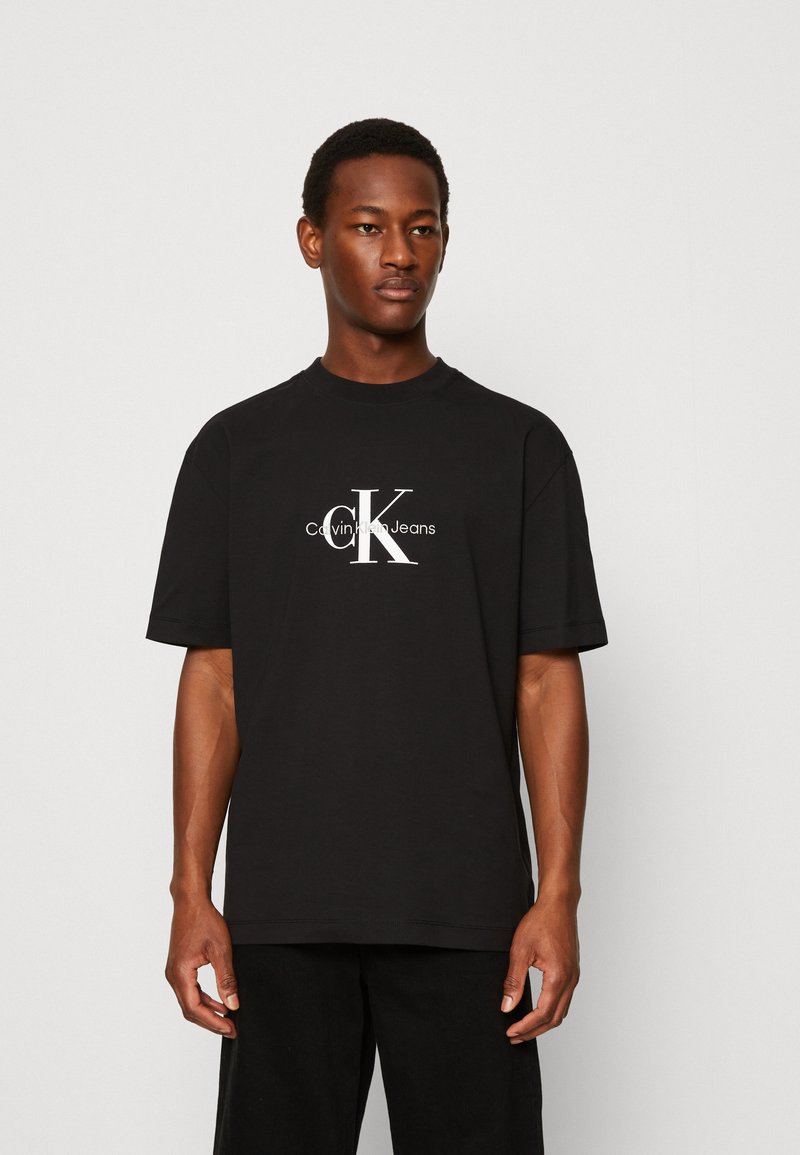 Calvin Klein Jeans MONOLOGO TEE UNISEX - Nyomott mintás póló - black/fekete - Zalando.hu