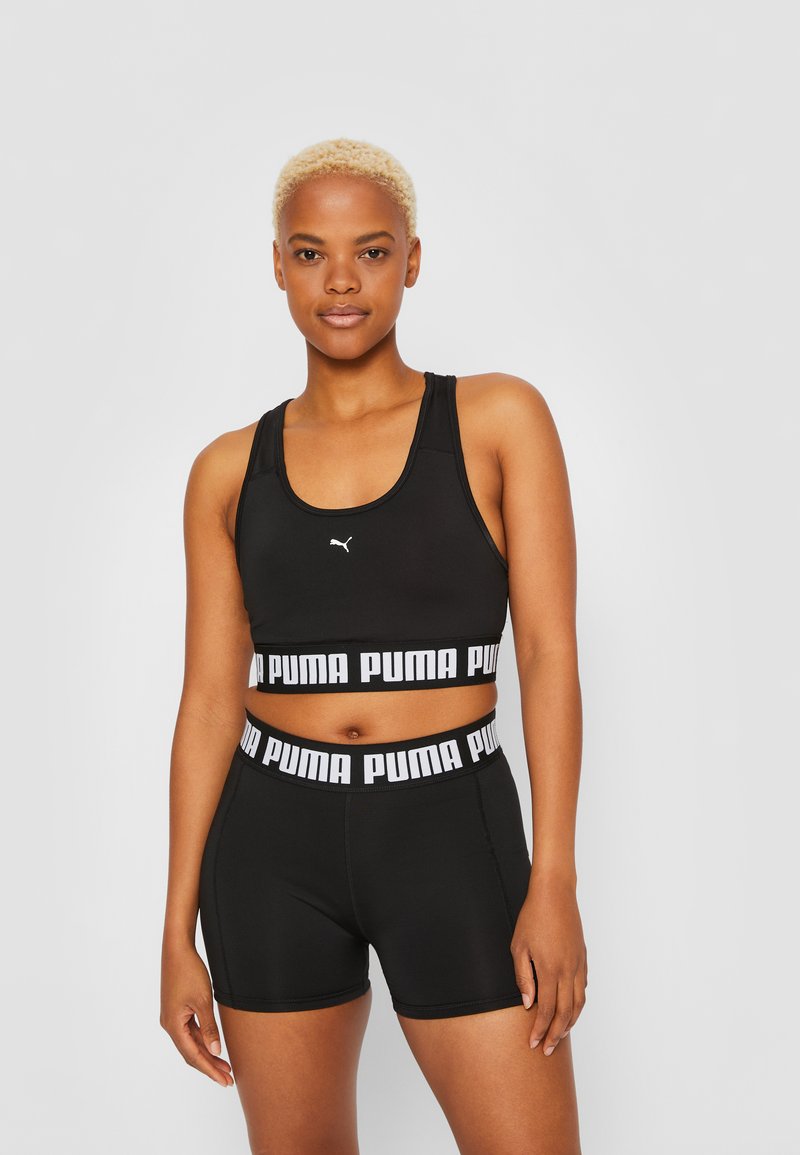 Puma MID IMPACT STRONG BRA - Medium support sports bra - black - Zalando.ie