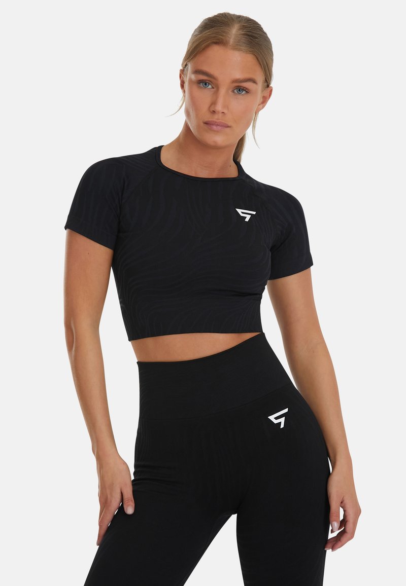 SQUATPROOF SAVANNAH SEAMLESS PATTERN - Basic T-shirt - black - Zalando.ie