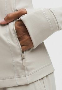 lululemon DEFINE NULU™ - Training jacket - downtown tan/khaki - Zalando