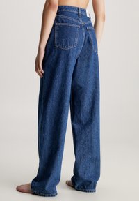 Calvin Klein Jeans HIGH RISE RELAXED - Jeans Relaxed Fit - denim medium ...