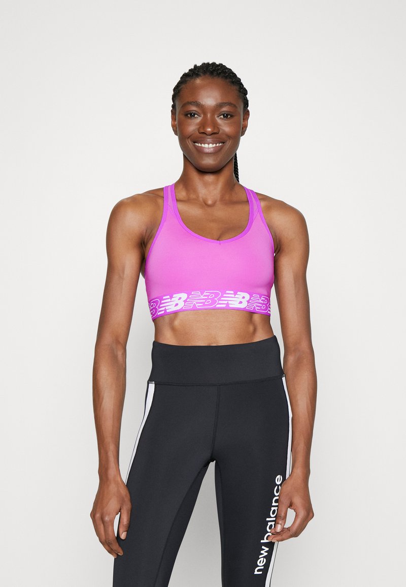 New Balance PACE BRA - Medium support sports bra - cosmic rose/pink ...