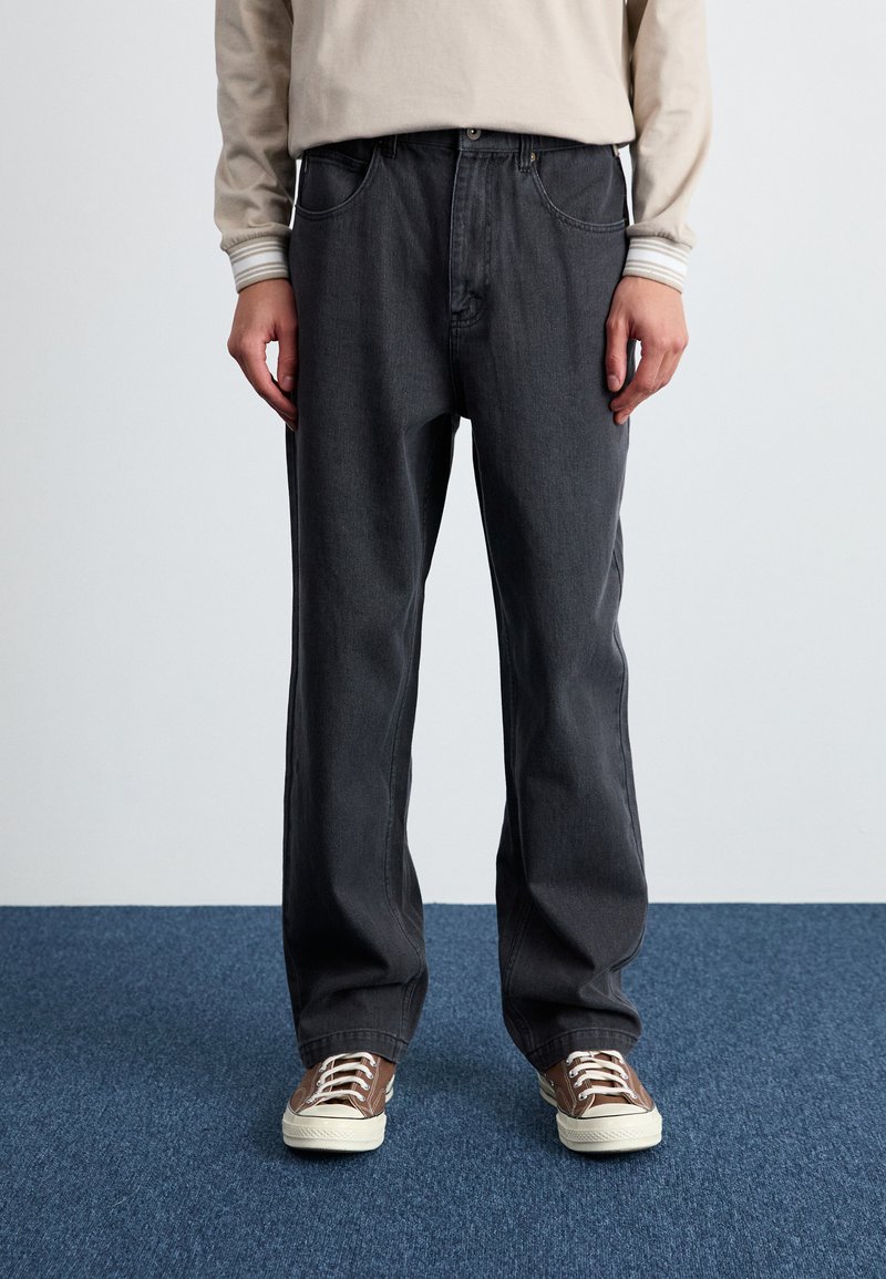 Converse OPEN HEM BAGGY PANT - Relaxed fit jeans - washed black/black ...
