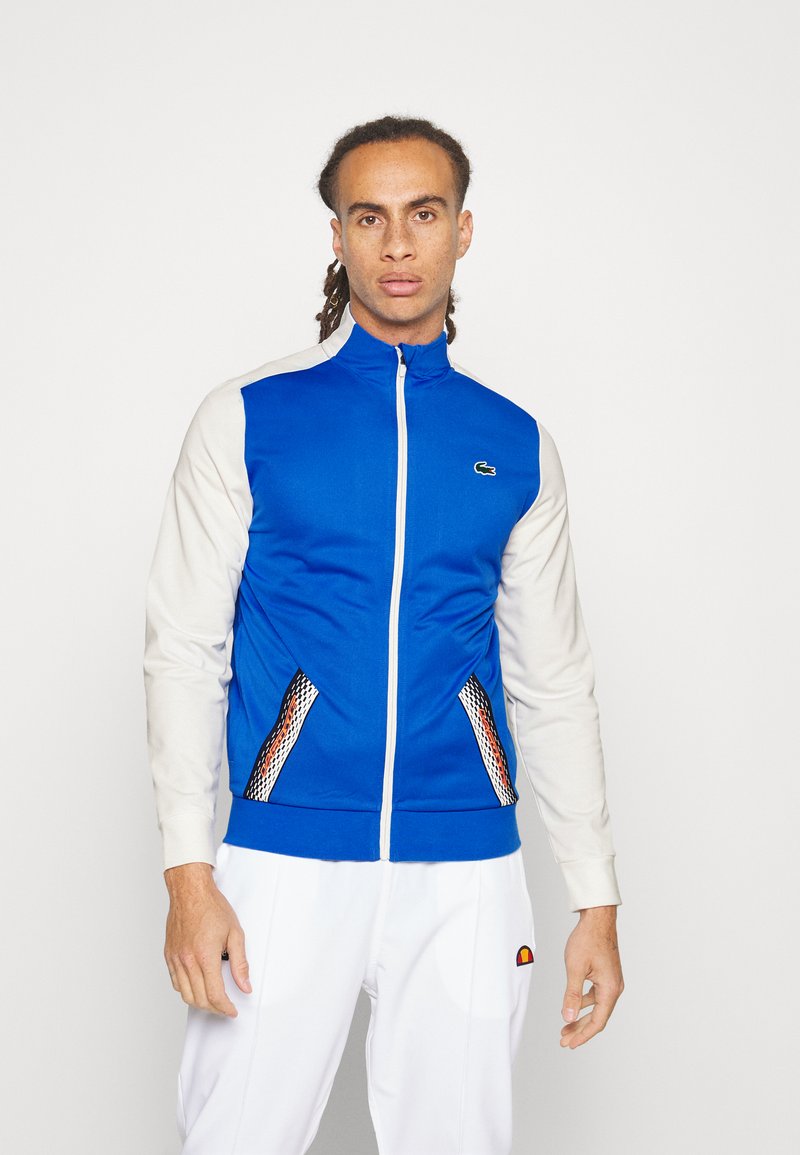 Lacoste Sport TENNIS JACKET TAPERED - Giacca sportiva - kingdom/flour ...