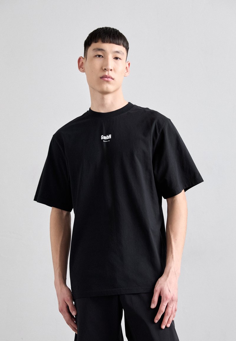 GmbH LOGO - Basic T-shirt - black - Zalando.ie
