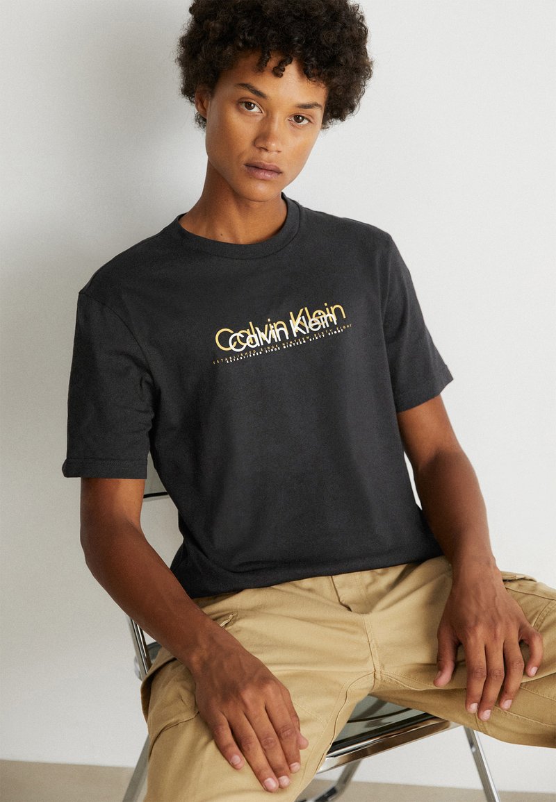 Calvin Klein DOUBLE FLOCK LOGO - Print T-shirt - black - Zalando.co.uk