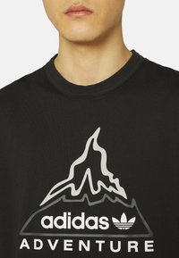 adidas Originals VOLCANO TEE - T-shirt con stampa - black/nero - Zalando.it