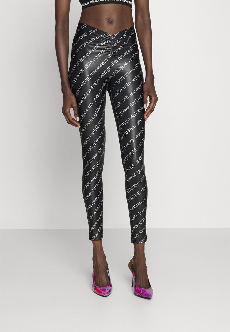 Versace Jeans Couture PRINT LOGO SIGNATURE - Leggings - Trousers ...
