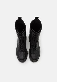 Koi Footwear Platform boots - black - (Pre-owned) - Zalando