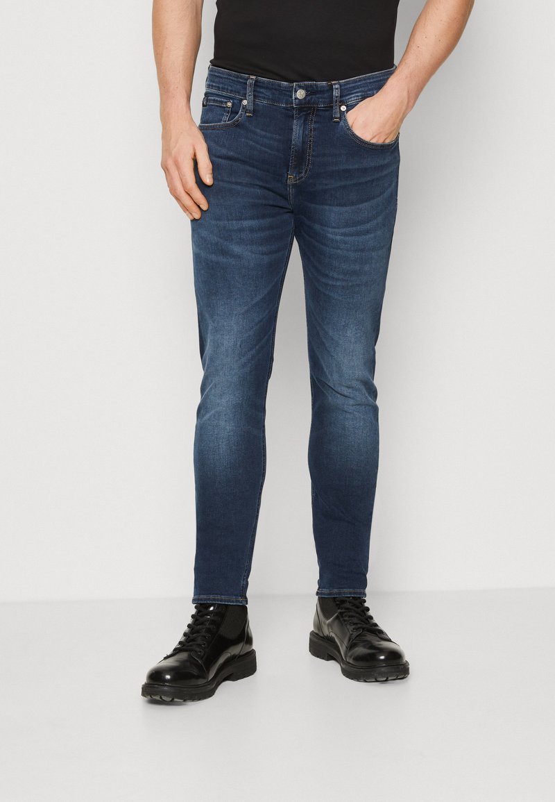 Calvin Klein Jeans SKINNY - Jeans Skinny Fit - denim dark/dark-blue denim - Zalando.at