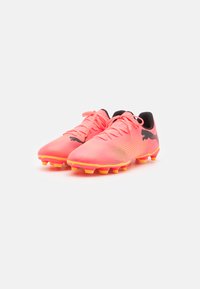 Puma FUTURE 7 PLAY FG/AG - Moulded stud football boots - sunset glow ...