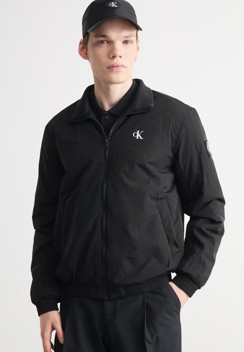 Calvin Klein Jeans PADDED HARRINGTON - Light jacket - black - Zalando