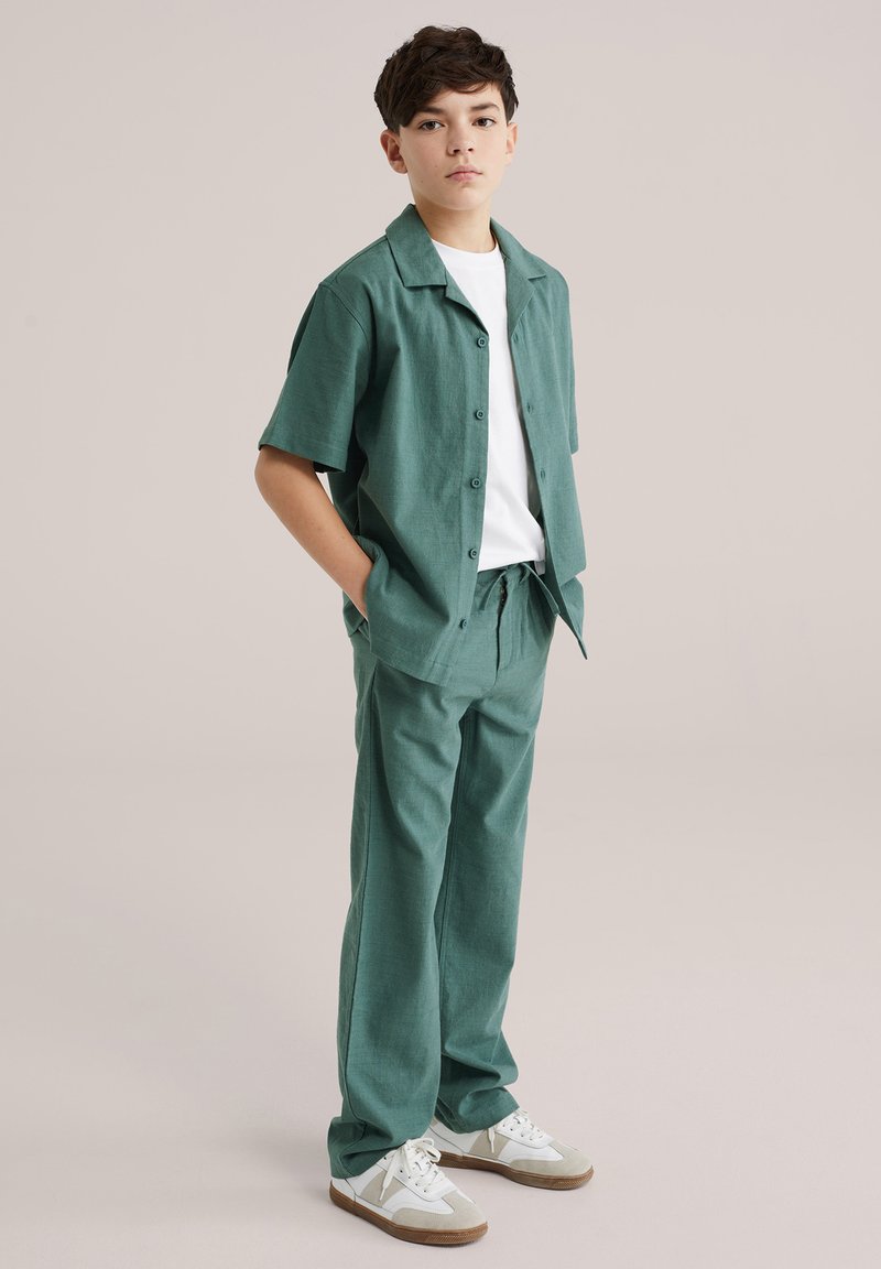 WE Fashion Kalhoty - sea green/obrubový denim - Zalando.cz