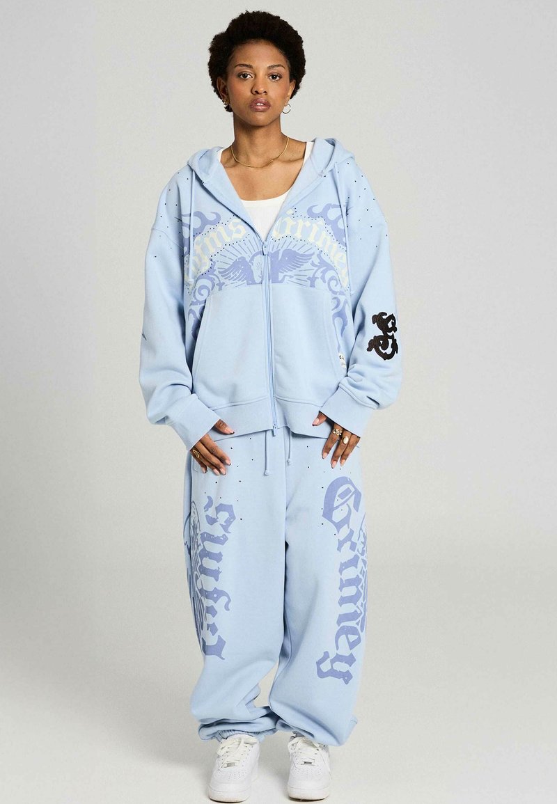 Grimey CHIEF WATCHER BAGGY - Tracksuit bottoms - light blue - Zalando