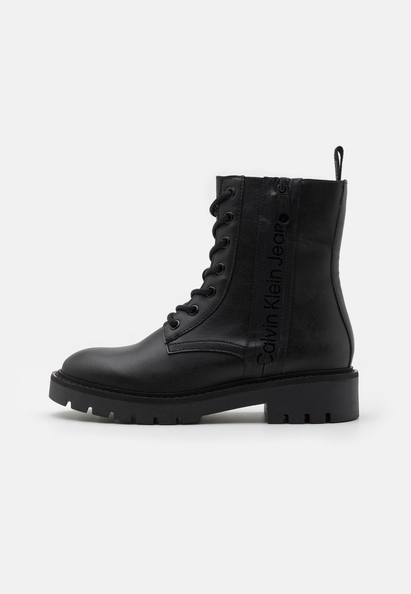Calvin Klein Jeans COMBAT LACEUP BOOT - Platform ankle boots - triple ...
