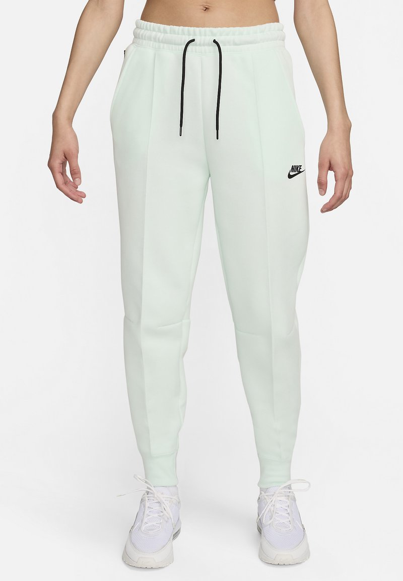 Nike Sportswear TECH - Tracksuit bottoms - barely green black/green ...