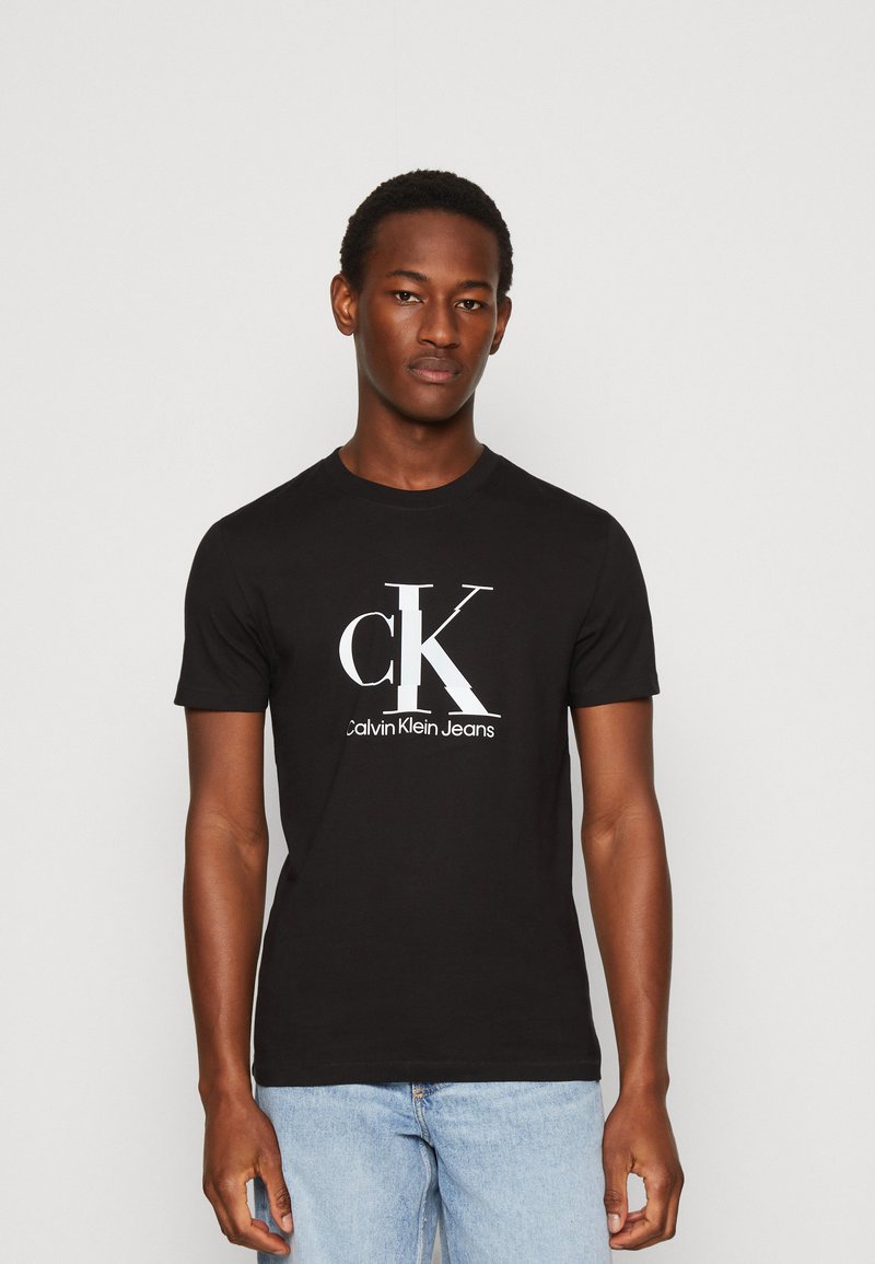 Calvin Klein Jeans Disrupted Monologo Nyomott Mintás Póló Black