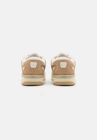 Puma 180 UNISEX - Skate shoes - sugared almond/prairie tan/beige ...