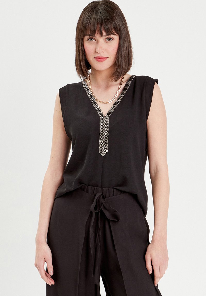 Cache Cache MIT KURZEN ÄRMELN - Top - noir/schwarz - Zalando.de