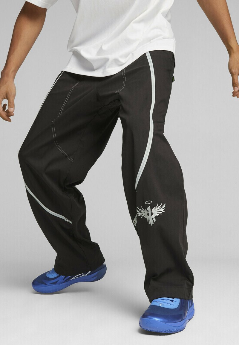 Puma MELO X TOXIC DIME BASKETBALL - Jogginghose - black/schwarz ...