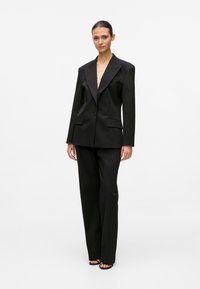 KARL LAGERFELD AMBER VALLETTA STRUCTURED - Trousers - black - Zalando