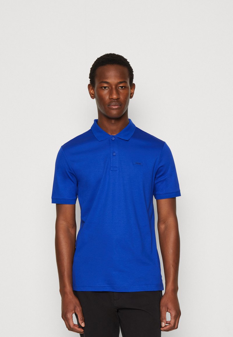 Calvin Klein Polo - mid azure blue/azul - Zalando.es