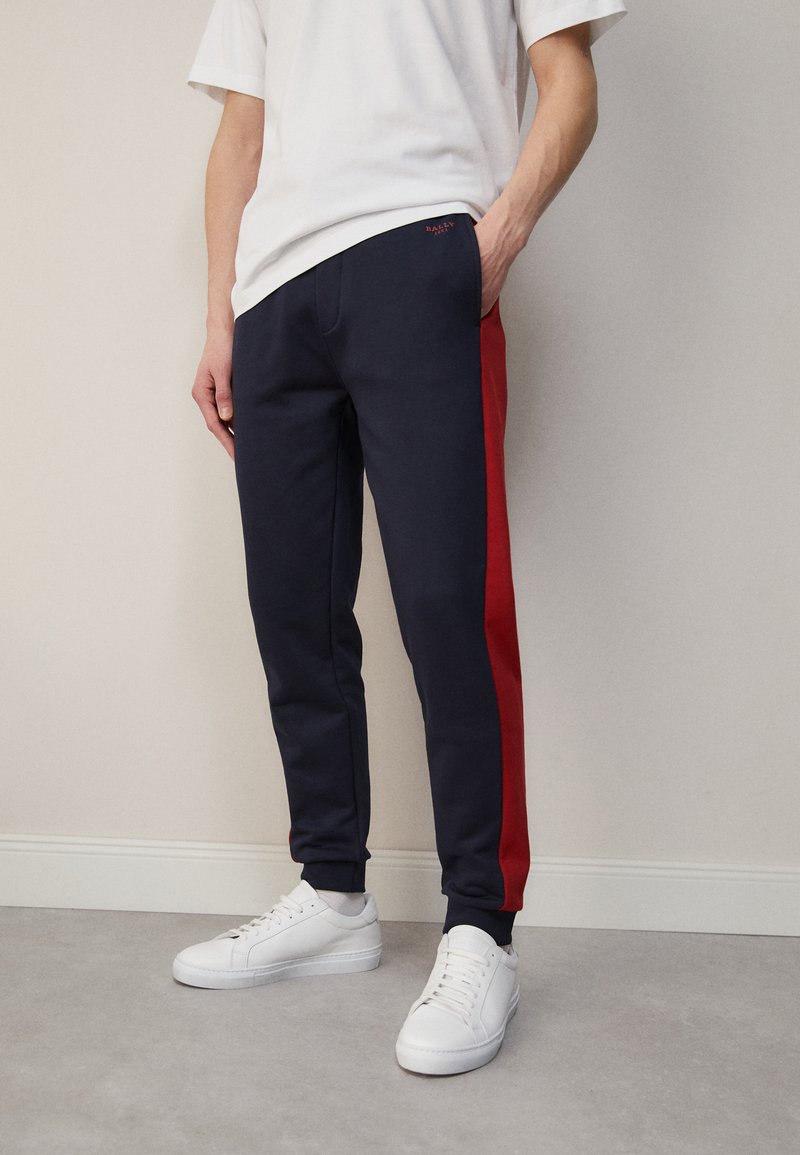Bally Tracksuit bottoms - ink/bally red/dark blue - Zalando.de