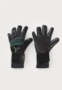 Puma ULTRA ULTIMATE HYBRID UNISEX - Goalkeeping gloves - black/green ...