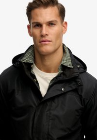Superdry & Co HOODED SHELL - Light jacket - black - Zalando