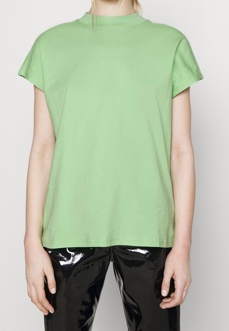 Weekday T-shirt basic - light green/verde chiaro - (Second hand ...
