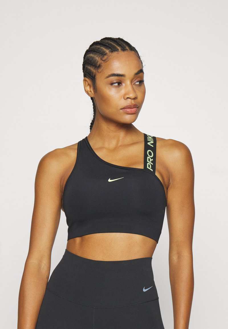 Nike Performance Stanik sportowy z średnim wsparciem/czarny - Zalando.pl