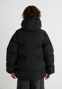 Weekday WAISTED PUFFER JACKET - Téli kabát - black/fekete - Zalando.hu