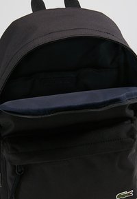 Lacoste Malý batoh - black/černá - (Pre-owned) - Zalando.cz