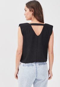 Cache Cache T-Shirt basic - noir/schwarz - Zalando.at