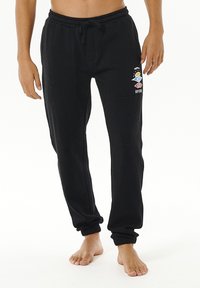 Rip Curl ICONS OF SURF - Tracksuit bottoms - black - Zalando