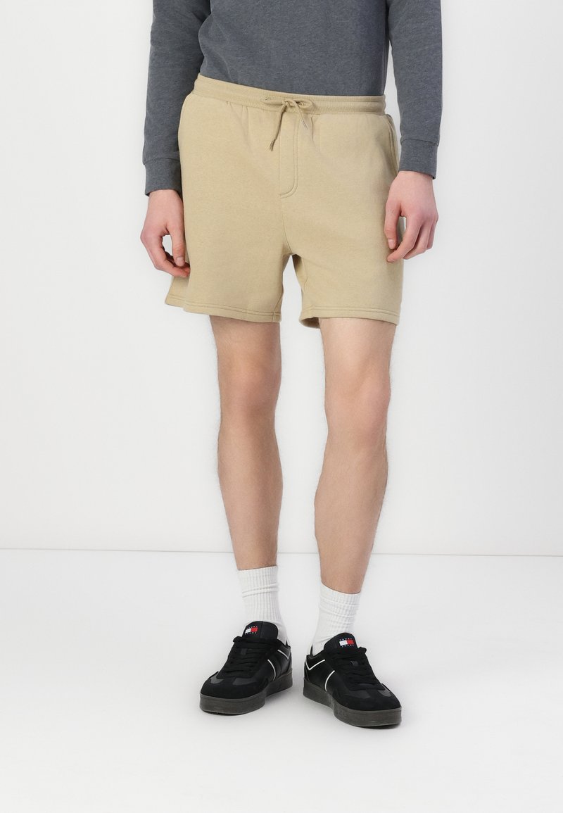 Tommy Jeans Shorts - relic tan/beige - Zalando