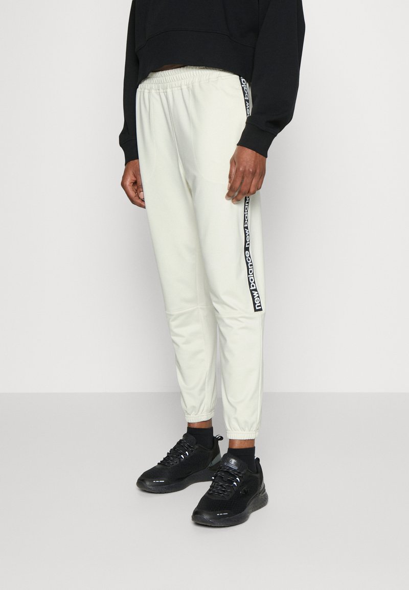 New Balance RELENTLESS JOGGER - Jogginghose - sea salt heather/offwhite ...