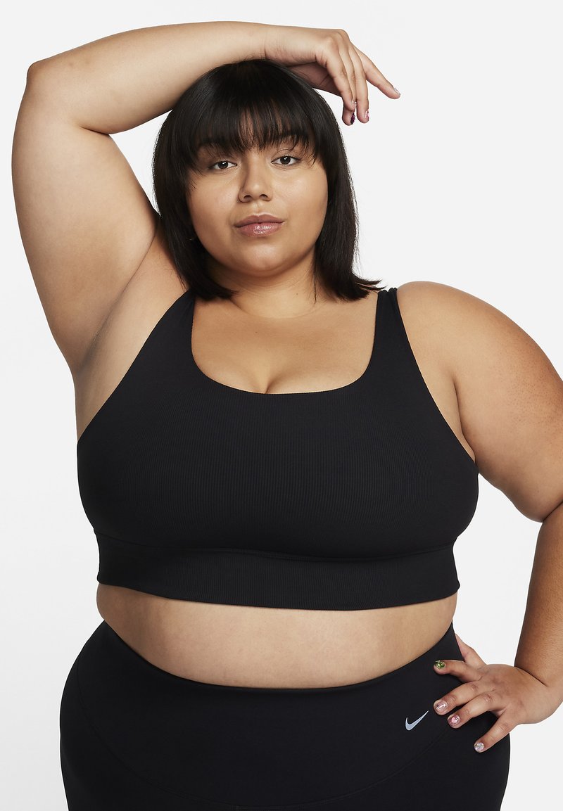 Nike Performance - Stanik sportowy z średnim wsparciem/czarny - Zalando.pl