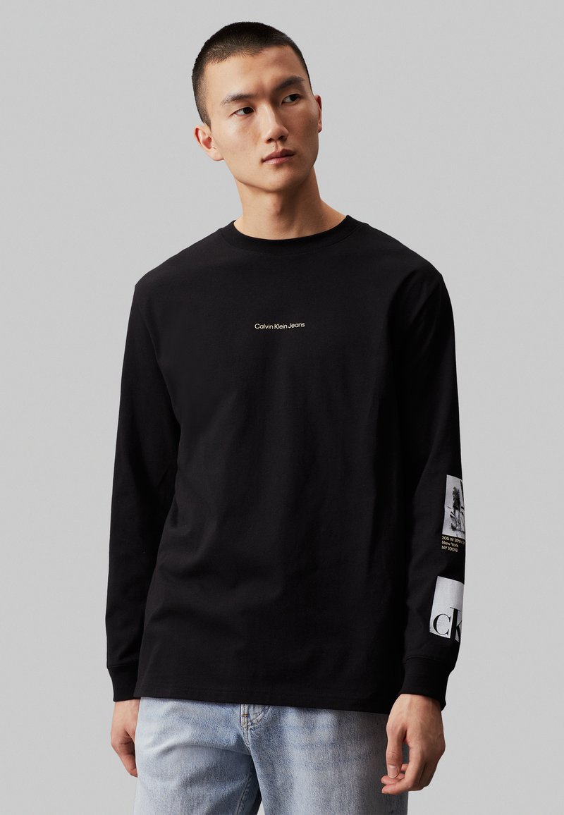 Calvin Klein Jeans MULTI GRAPHIC TEE - Pikkade varrukatega topp - black ...