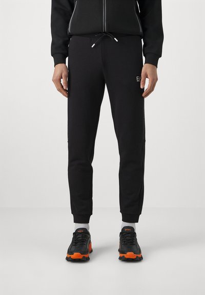 EA7 Emporio Armani TROUSERS - Pantalon de survêtement - black/noir - ZALANDO.CH