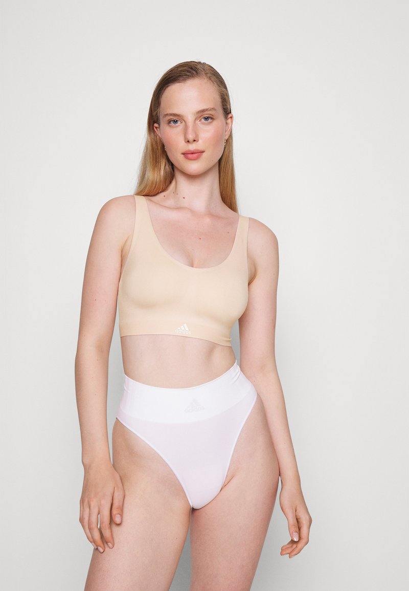 Adidas Sportswear Naked Seamless Removable Cookies Bustier Peach