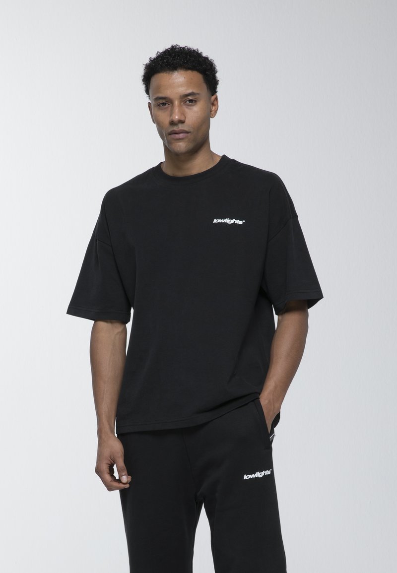LOW LIGHTS STUDIOS® UNISEX - Basic T-shirt - black - Zalando.de