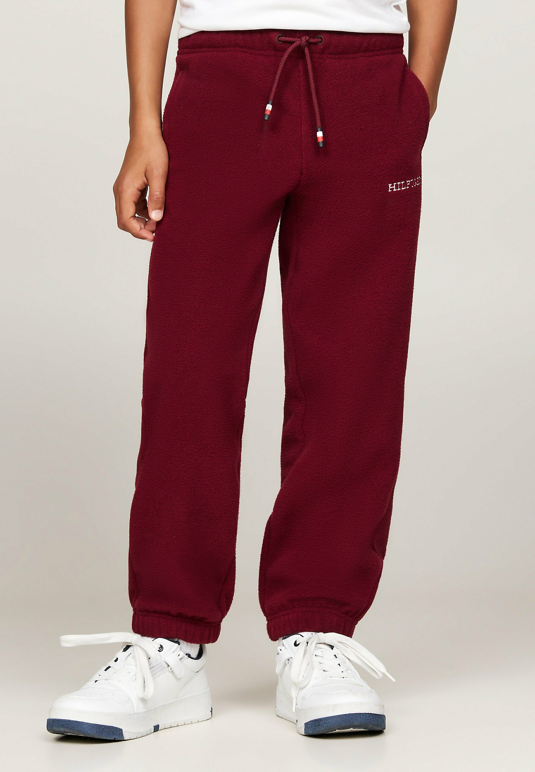 Tommy Hilfiger POLAR UNISEX Tracksuit bottoms deep rouge red Zalando