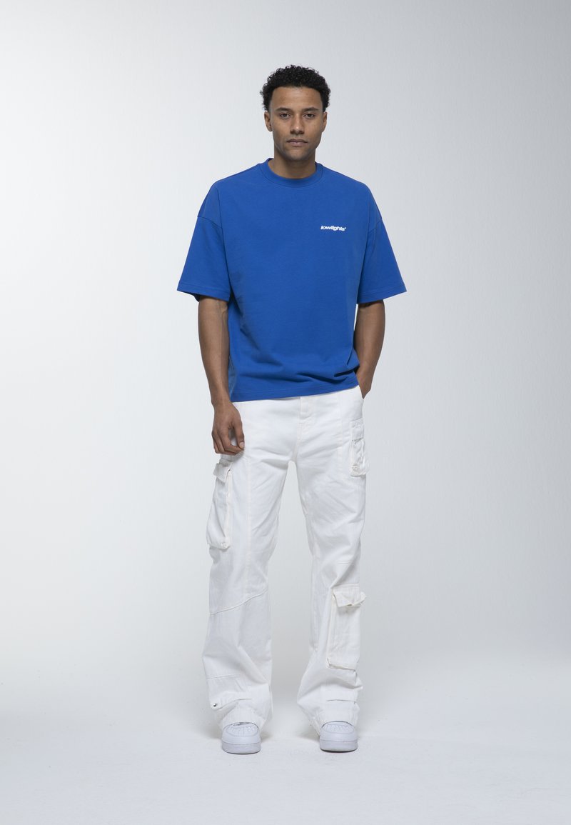 LOW LIGHTS STUDIOS® UNISEX - Basic T-shirt - blue - Zalando.ie