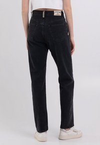 Replay Jeans Relaxed Fit - black denim - (Pre-owned) - Zalando.dk