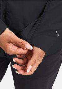 Jack Wolfskin TRAIL LIGHT HYBRID W - Ski jacket - black - Zalando